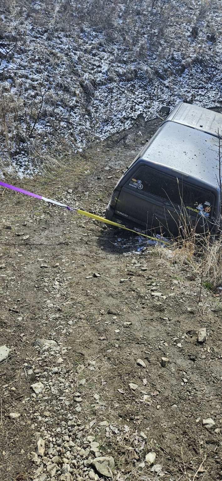 Toyota Tacoma high centered in mud - Offroad Portal
