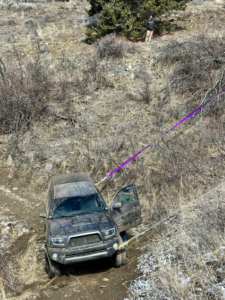 Toyota Tacoma high centered in mud - Offroad Portal