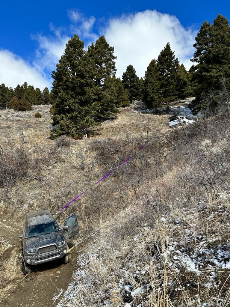 Toyota Tacoma high centered in mud - Offroad Portal
