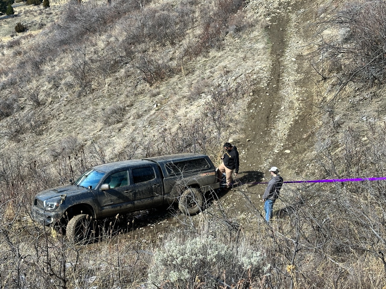 Toyota Tacoma high centered in mud - Offroad Portal