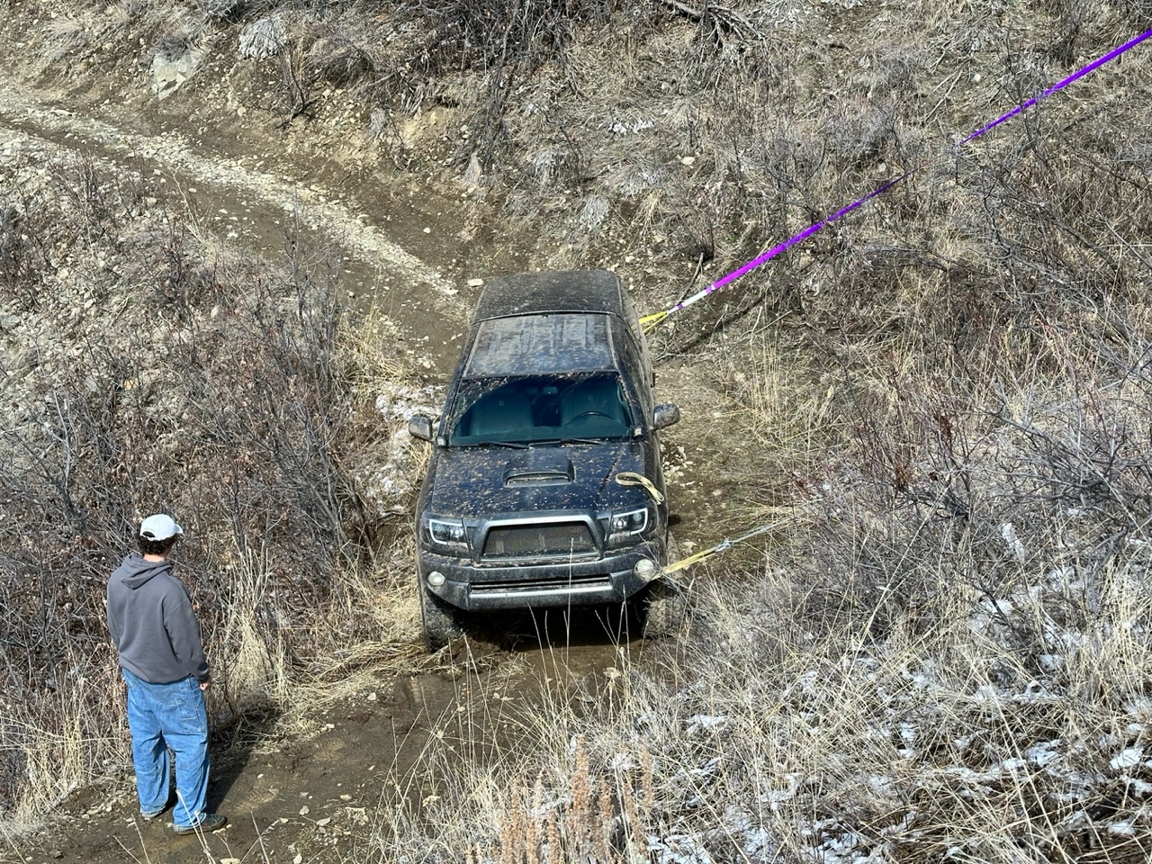 Toyota Tacoma high centered in mud - Offroad Portal
