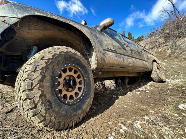Toyota Tacoma high centered in mud - Offroad Portal