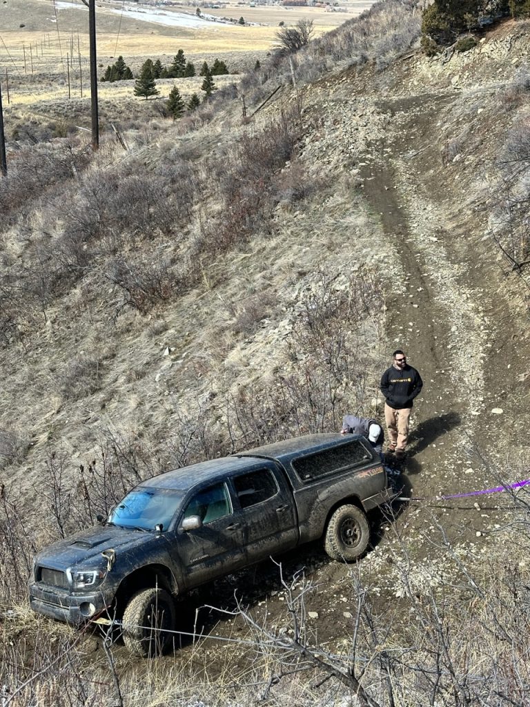 Toyota Tacoma high centered in mud - Offroad Portal