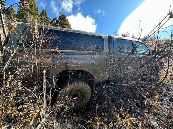 Toyota Tacoma high centered in mud - Offroad Portal