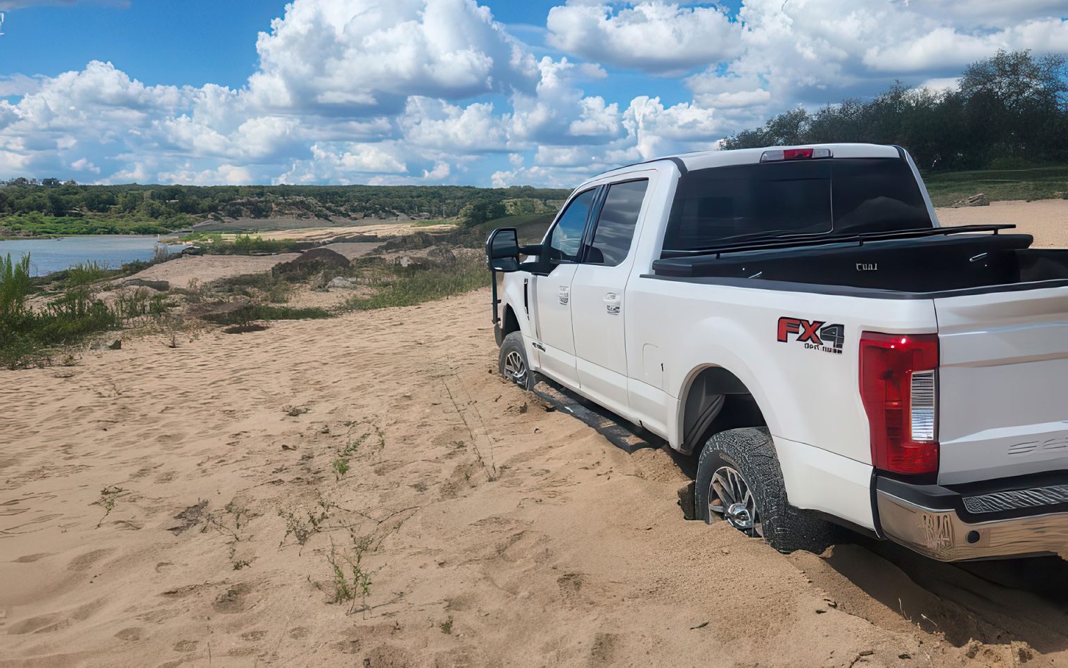 F250 buried to the frame in sand - Offroad Portal